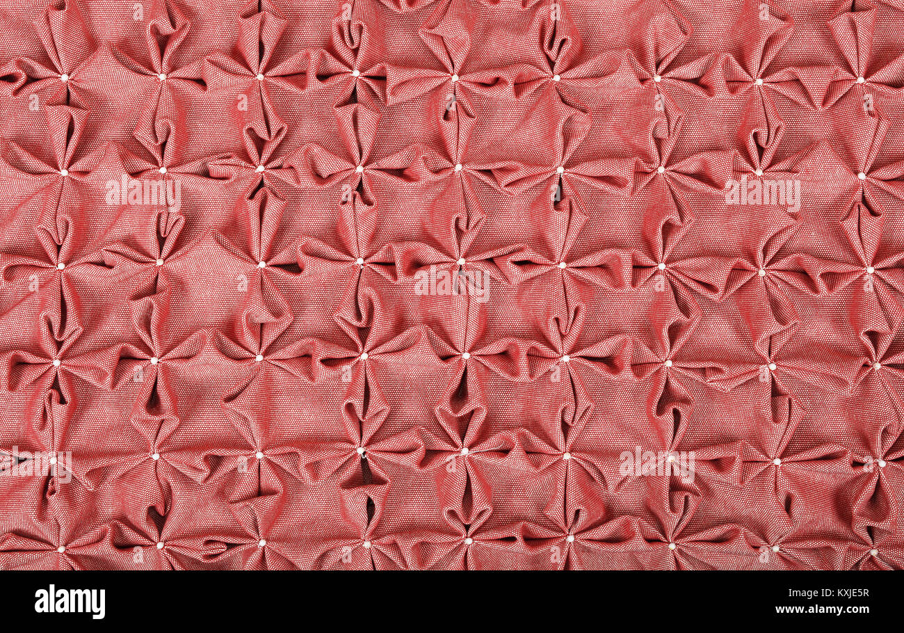 Close up background texture of pink red textile puffs for Canadian ...