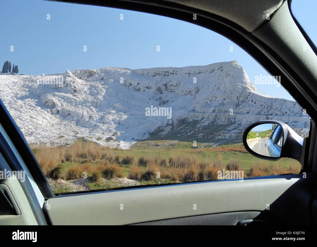 Recording through the window of a car on it sinter clips of Pamukkale ...