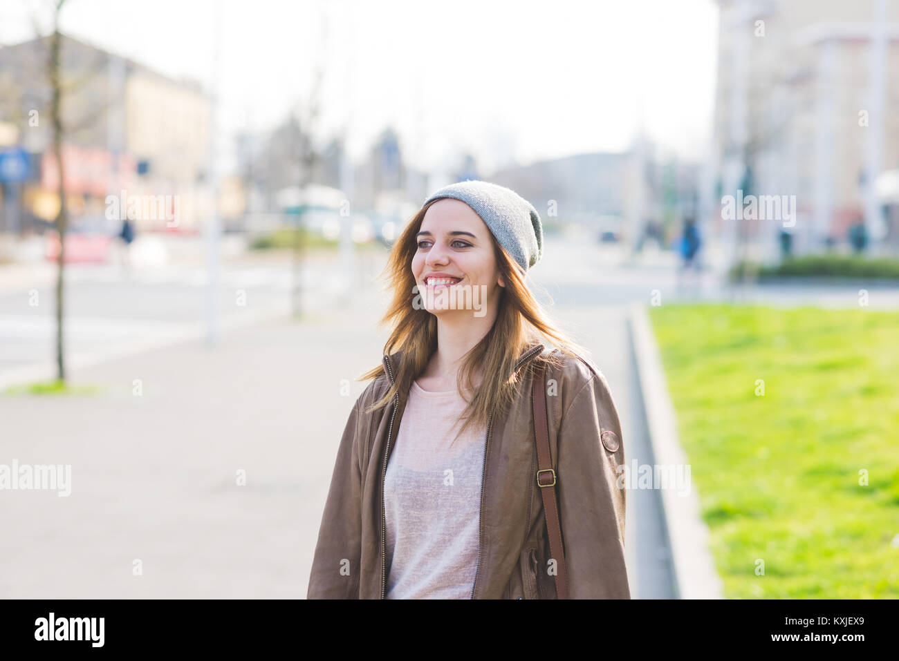 portrait young woman outdoor looking away smiling - happiness, positive ...