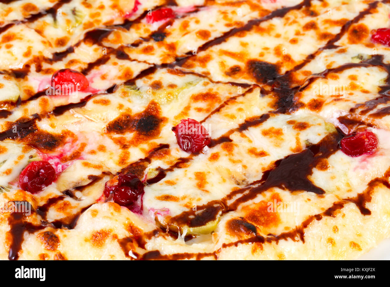 Sweet pizza with fruits and mozzarella Stock Photo - Alamy