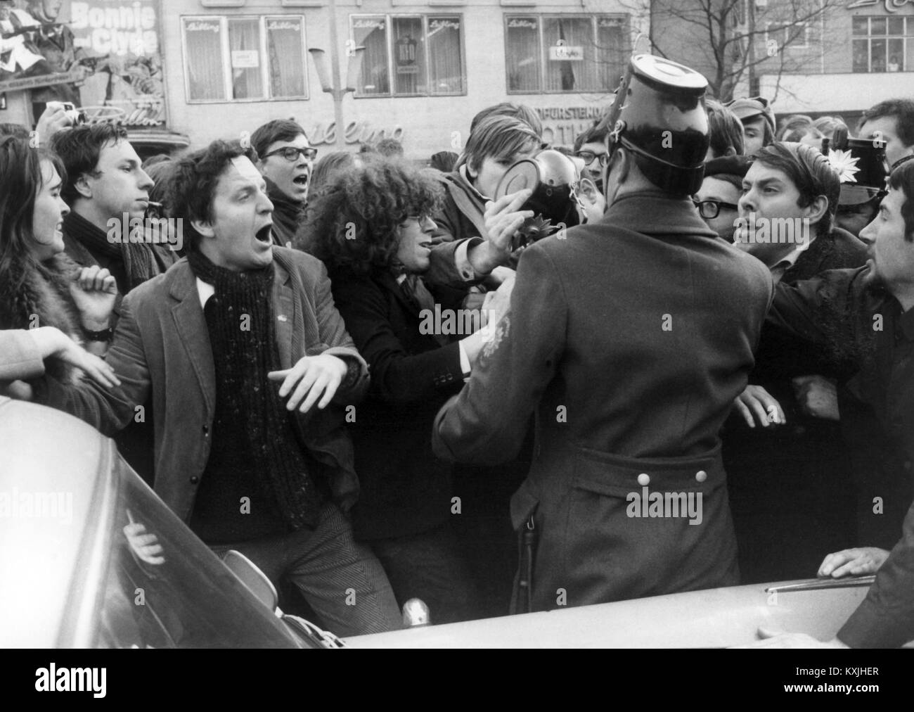 Demonstrators, including Commune-1 member Rainer Langhans (middle, with ...