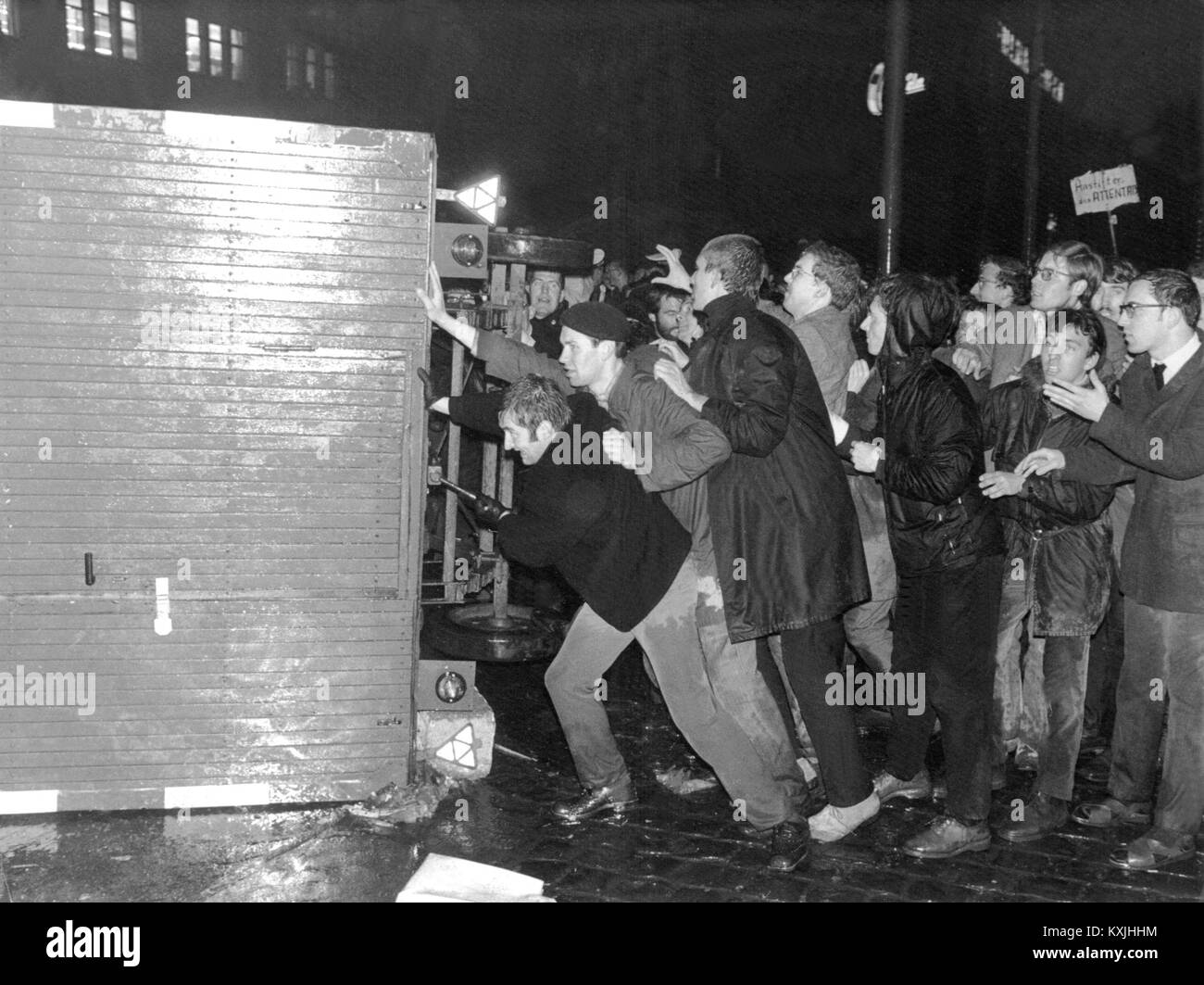 On the evening of 13 April 1968, young demonstrators try to barricade ...