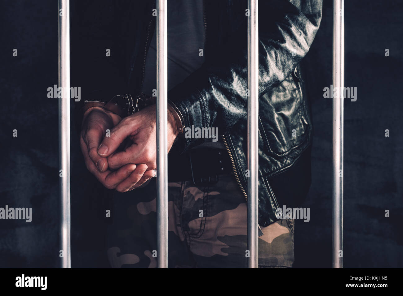 Man behind bars hi-res stock photography and images - Alamy
