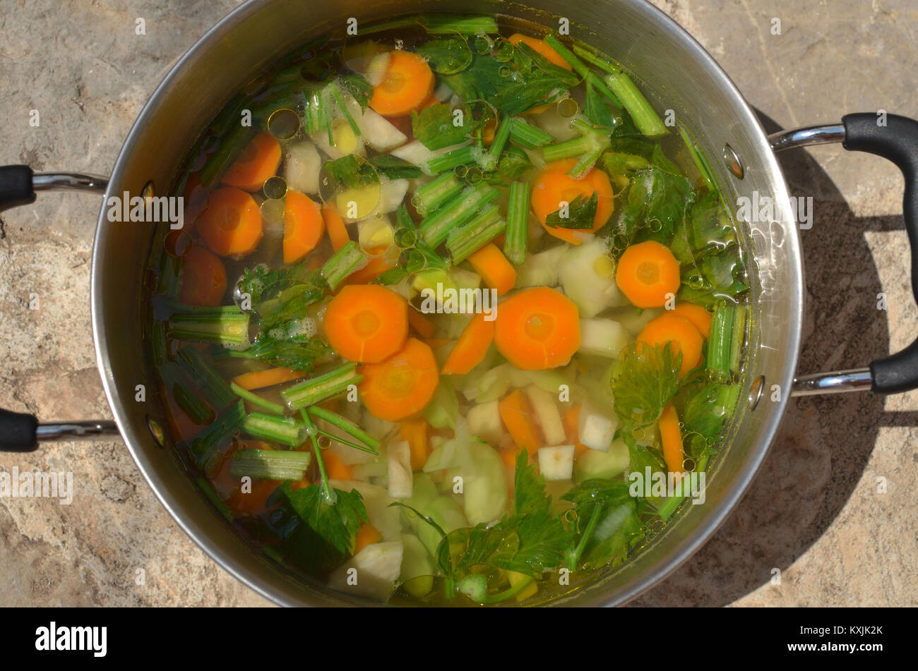 Boiling water bubbles in pot hi-res stock photography and images - Alamy