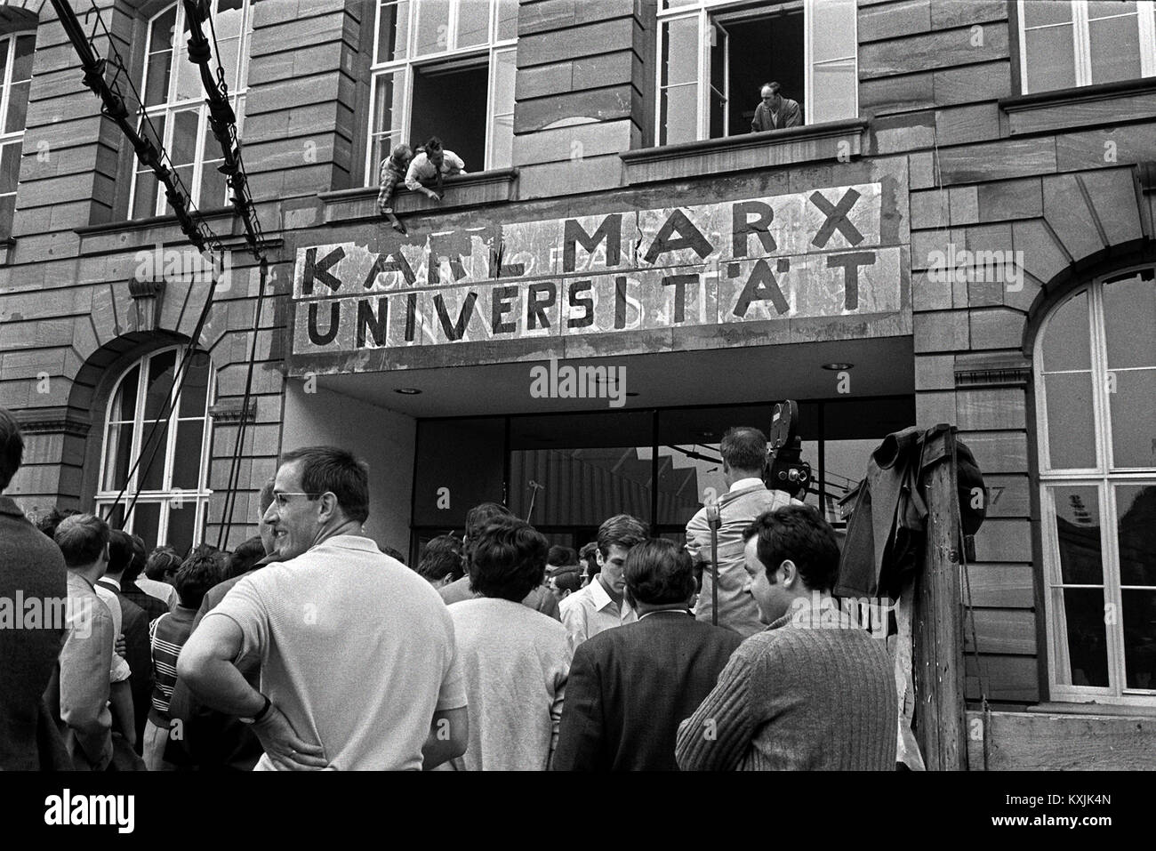 Opponents of the renaming attempt to remove the sticker "Karl Marx ...