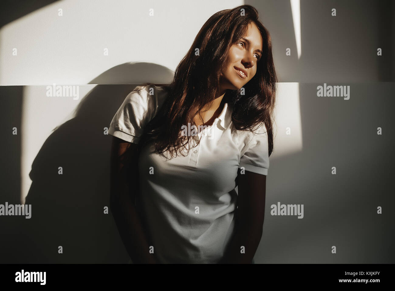 Portrait woman in shadow hi-res stock photography and images - Alamy