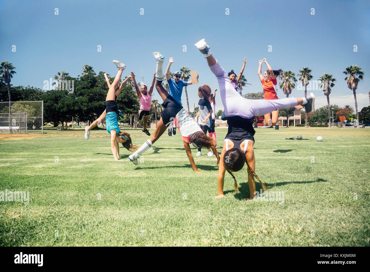 Girl Doing Cartwheel High Resolution Stock Photography and Images - Alamy