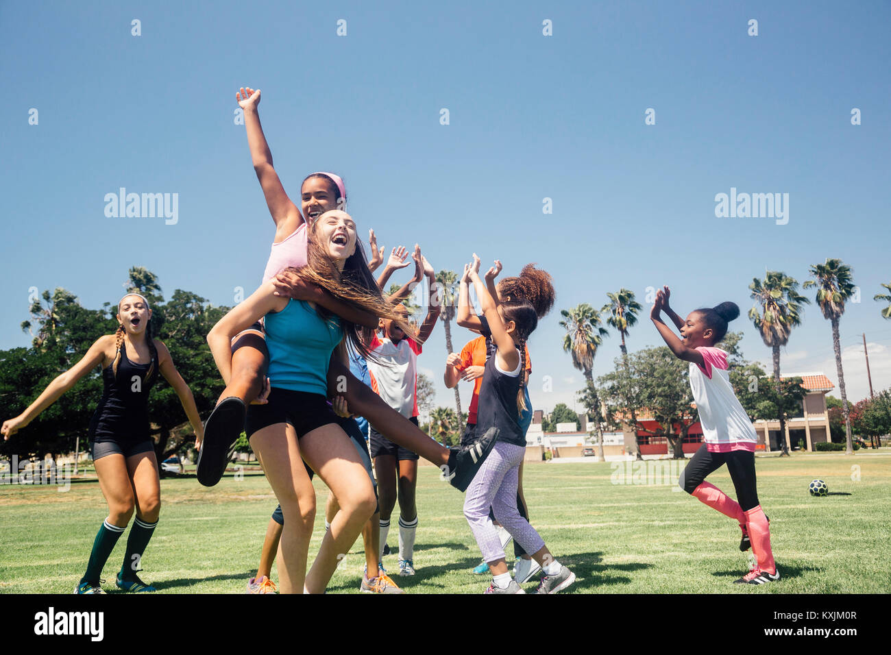 Action celebrating arms raised hi-res stock photography and images - Alamy