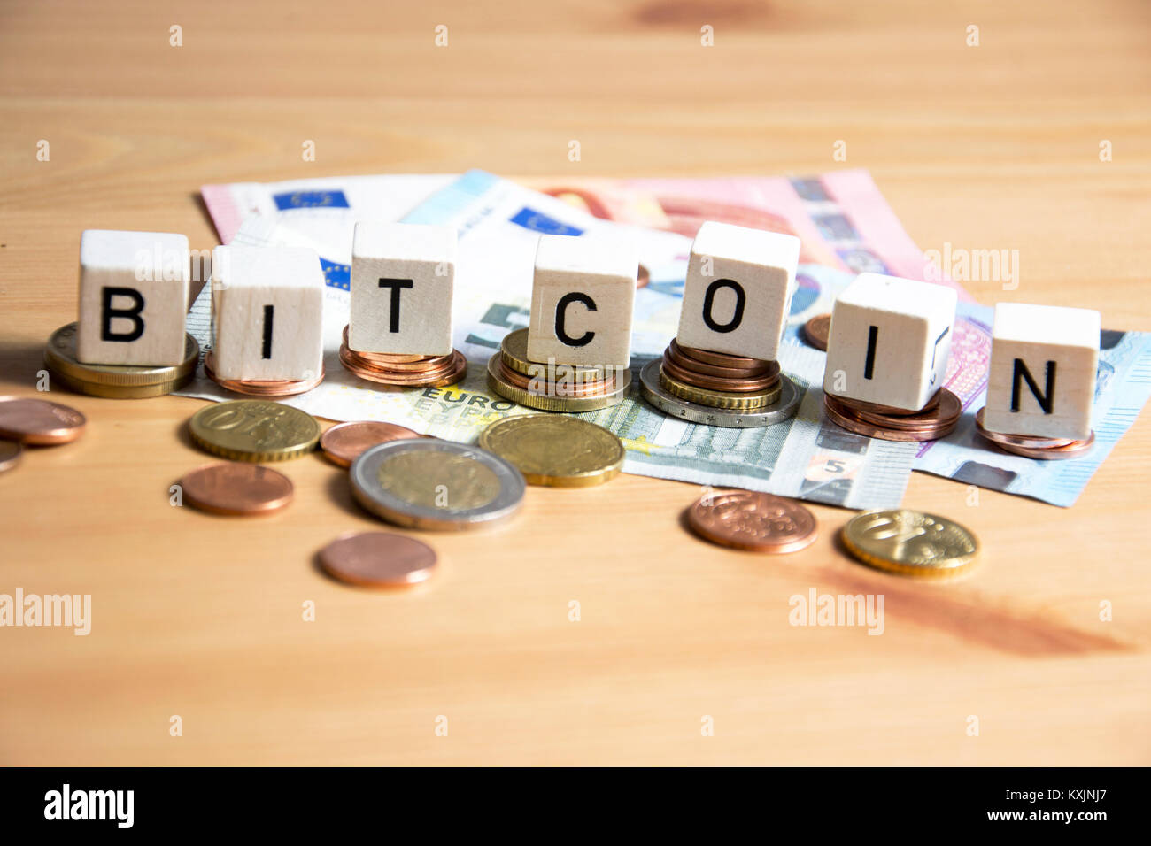 Bitcoin word written on wood cube Stock Photo - Alamy