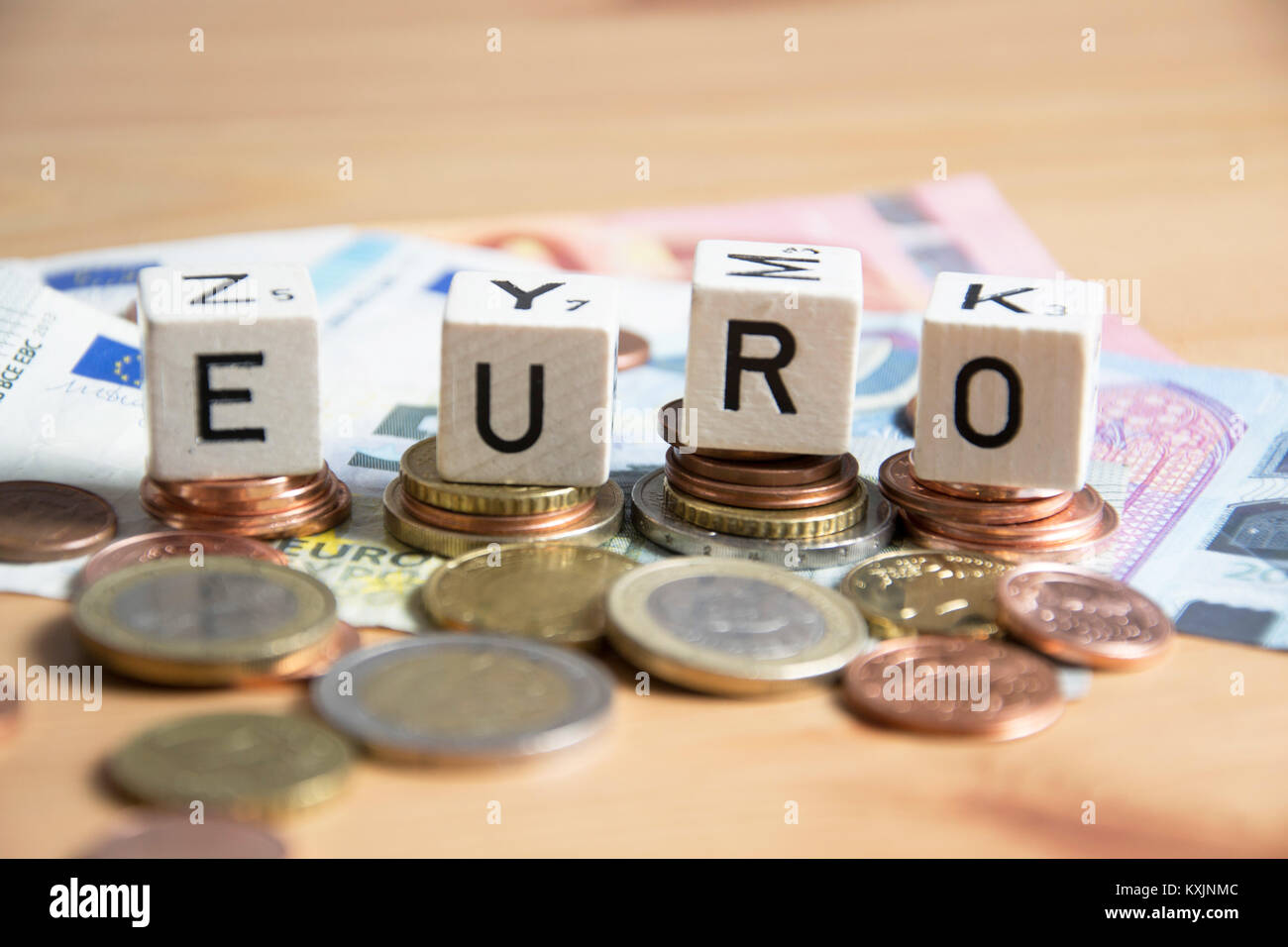 euro word written on wood cube Stock Photo - Alamy