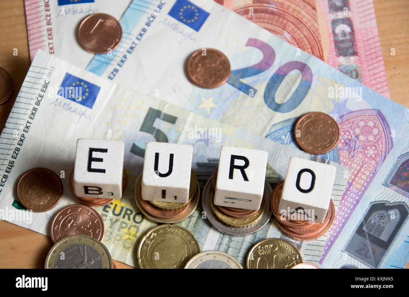 euro word written on wood cube Stock Photo - Alamy
