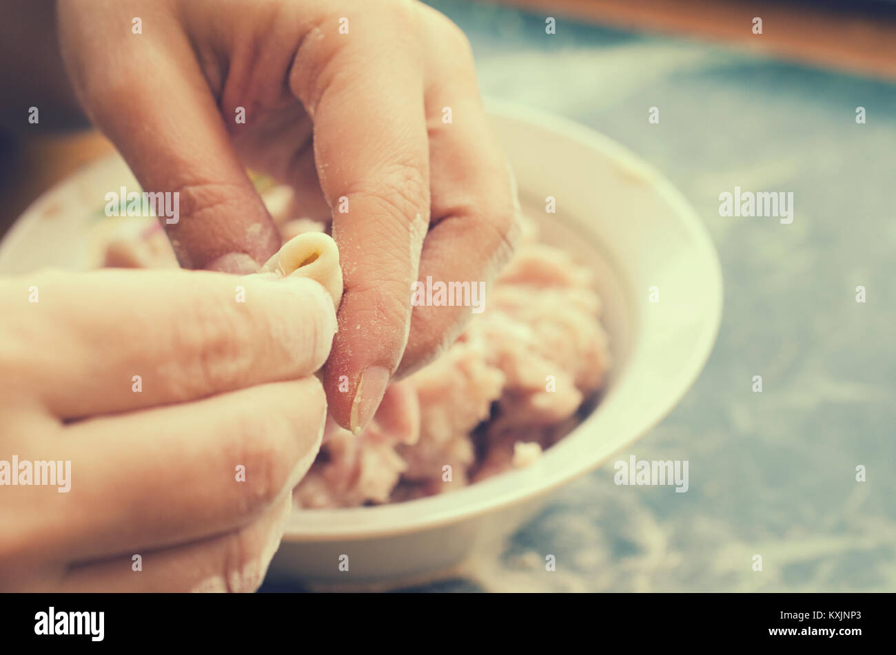 The process of making delicious home-made dumplings with meat Stock ...