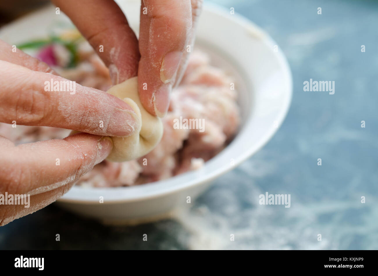 The process of making delicious home-made dumplings with meat Stock ...