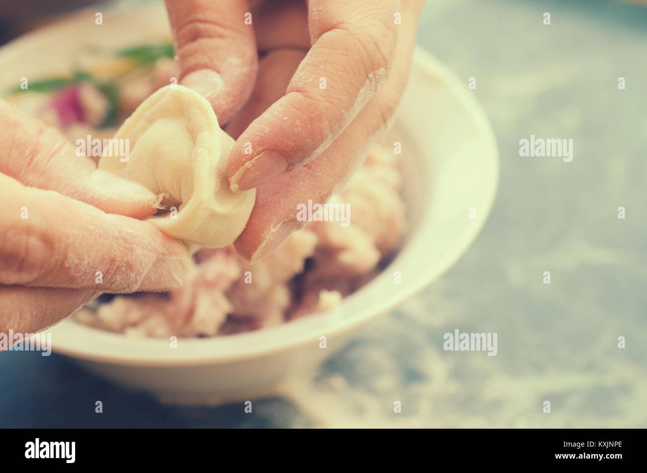The process of making delicious home-made dumplings with meat Stock ...