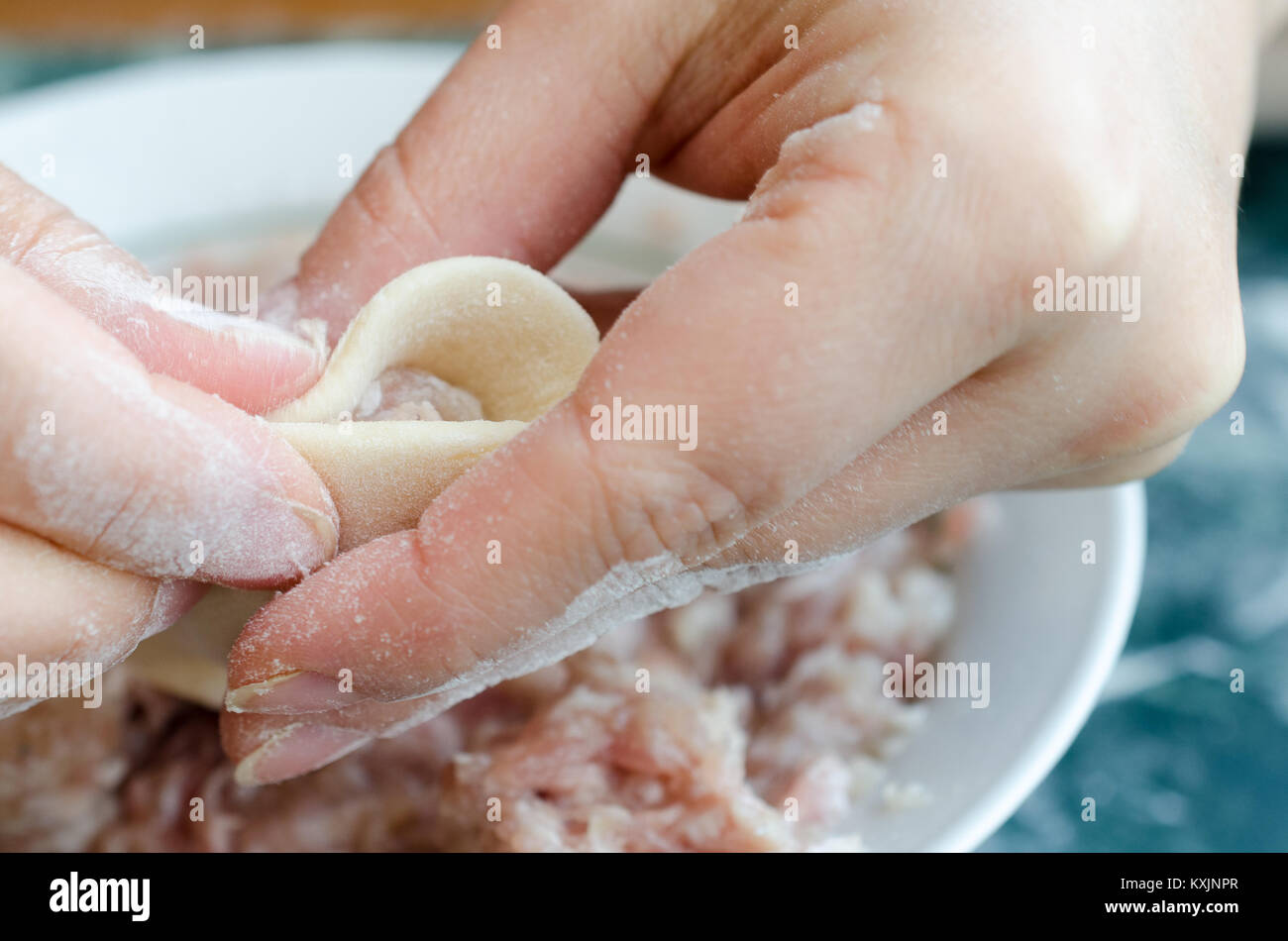 The process of making delicious home-made dumplings with meat Stock ...