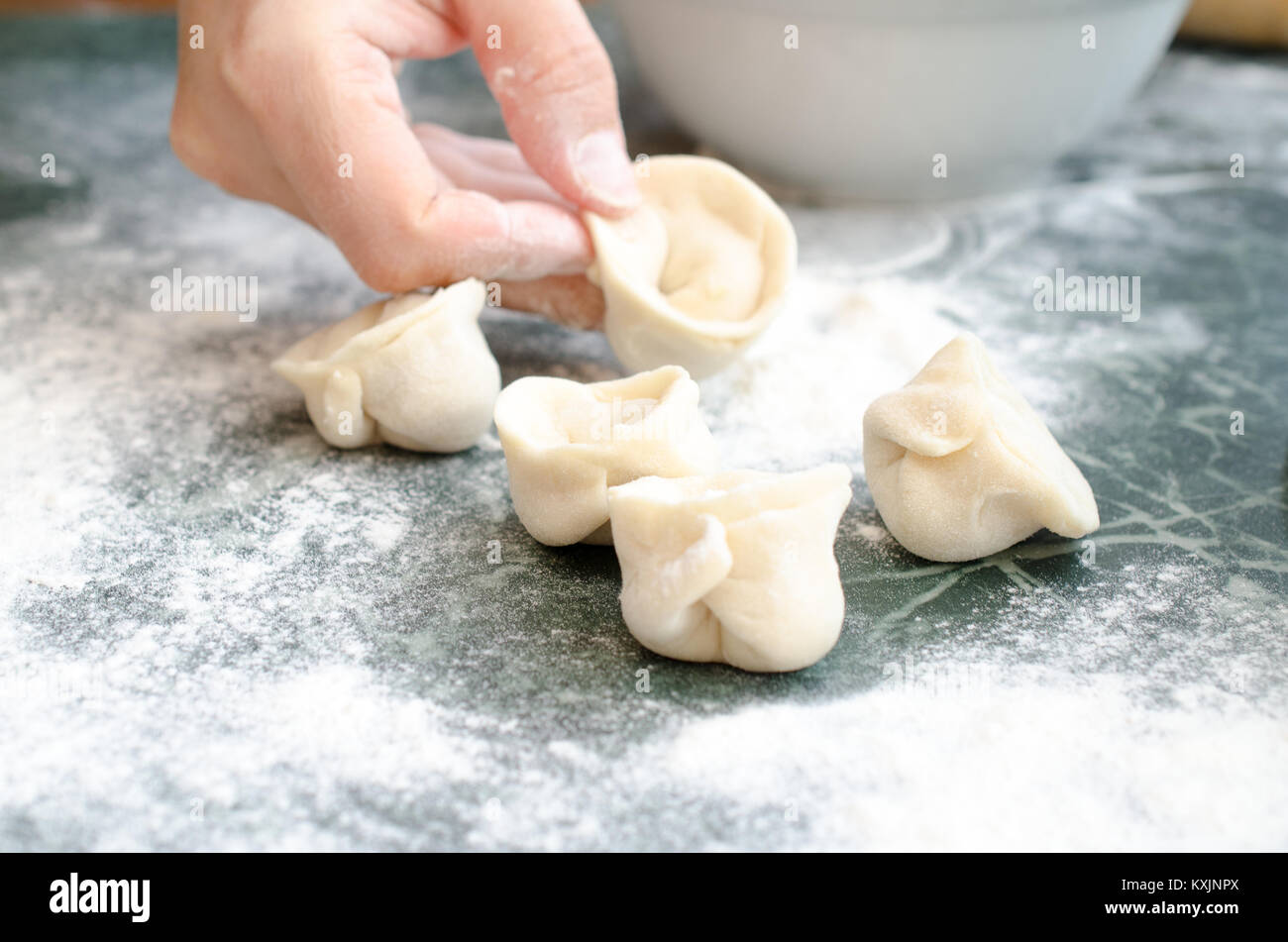 The process of making delicious home-made dumplings with meat Stock ...