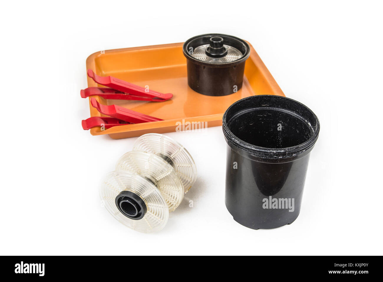 Old film tank developer with photo tools Stock Photo - Alamy