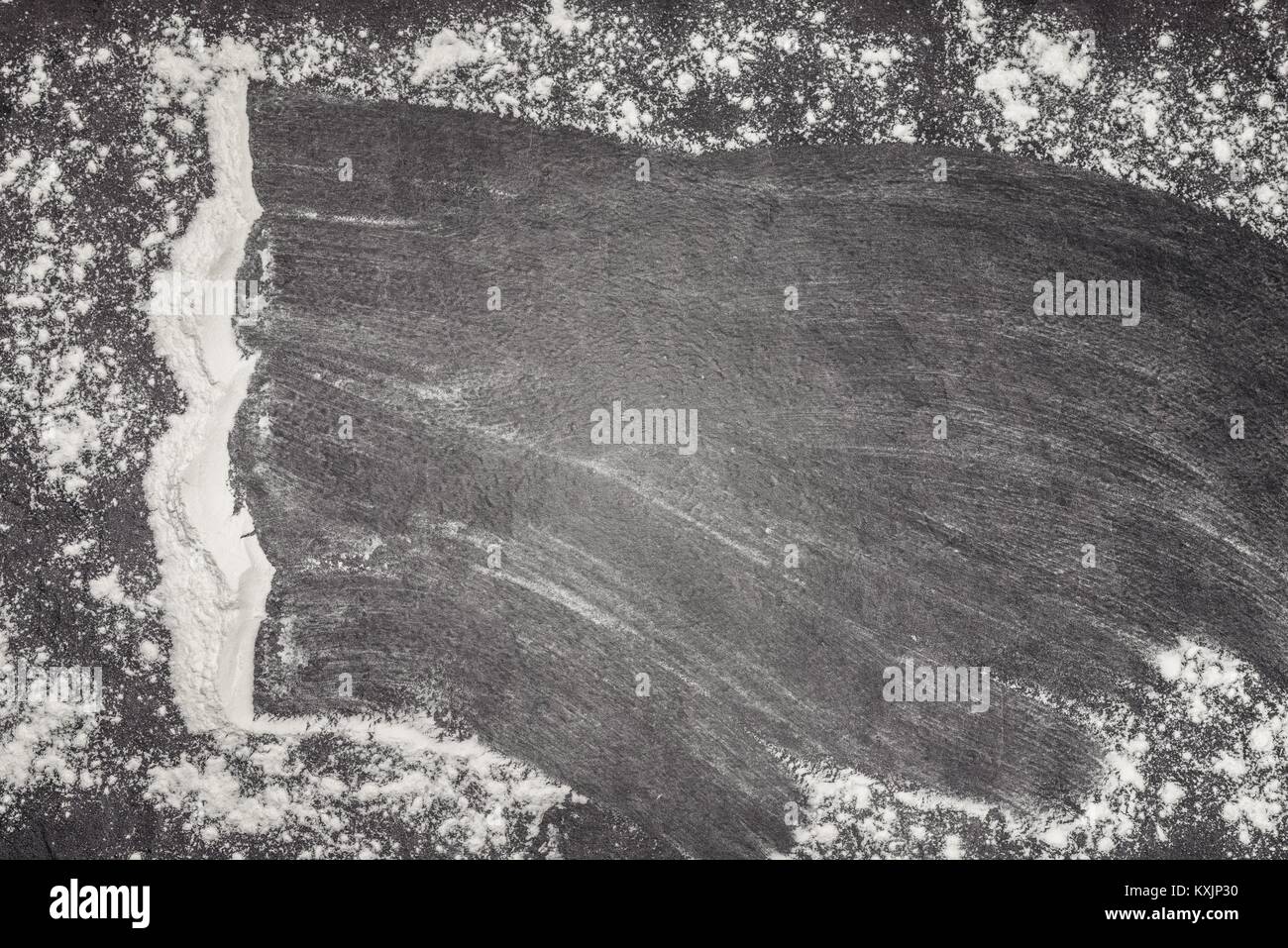 Wheat flour on grey working surface wiped away Stock Photo - Alamy