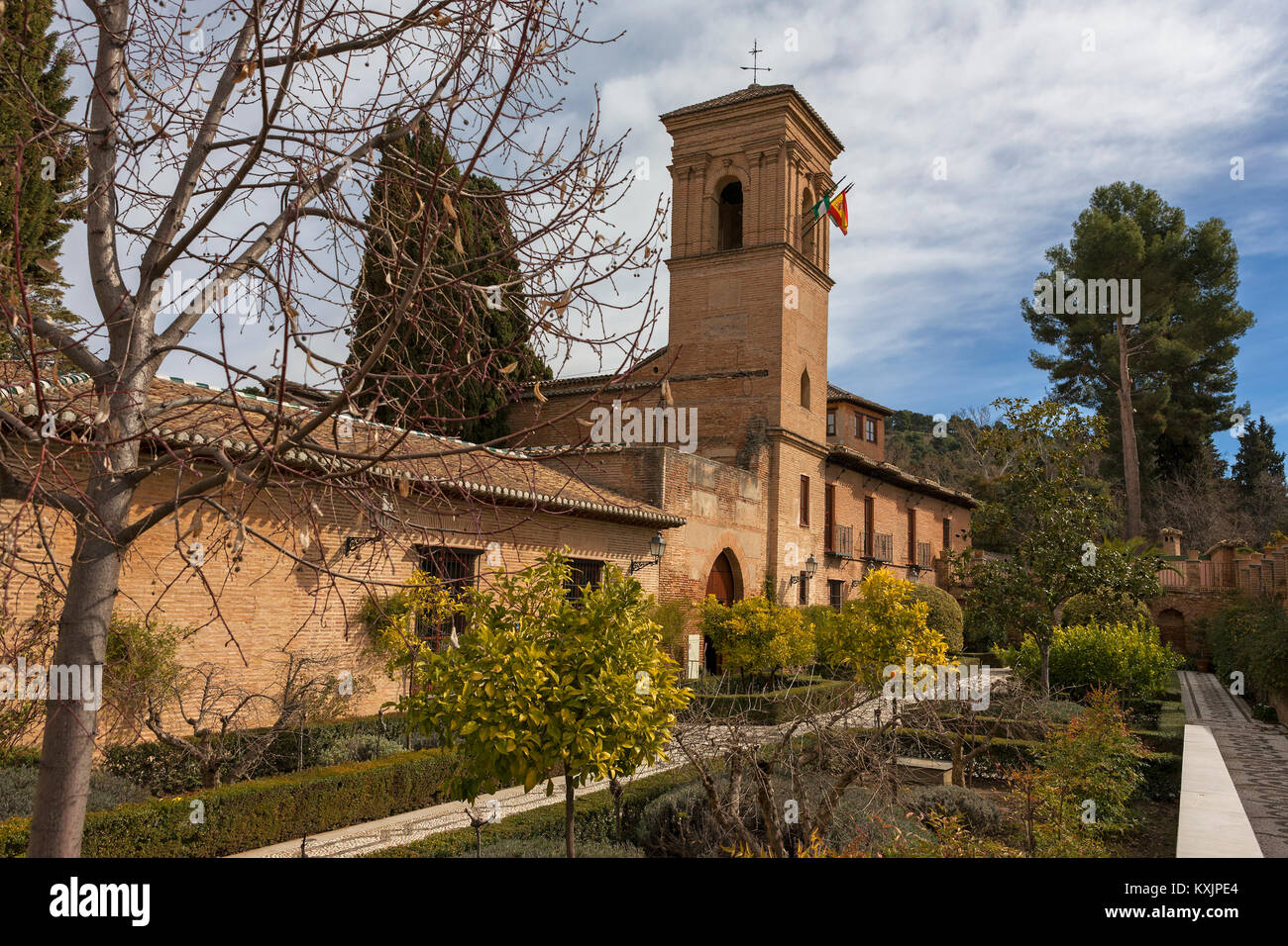 The formal gardens of the Convento de San Francisco, now a Parador ...