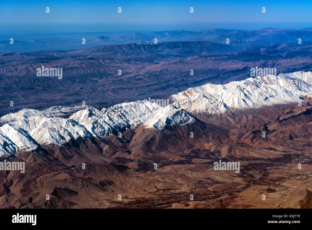 Aerial mountain view from aircraft Stock Photo - Alamy