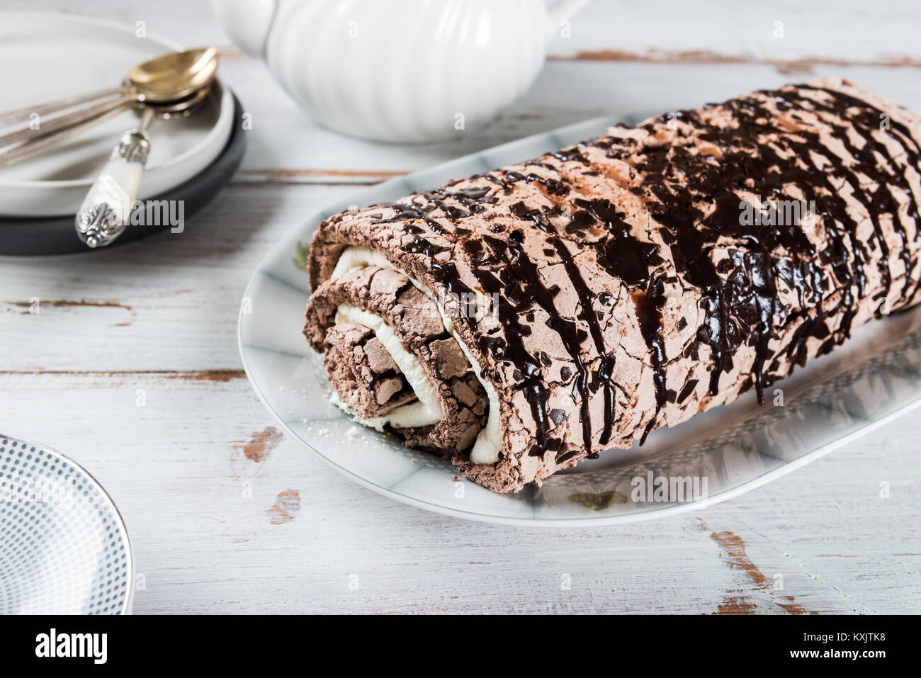 Belgian Chocolate Meringue Roulade filled with whipped cream and ...
