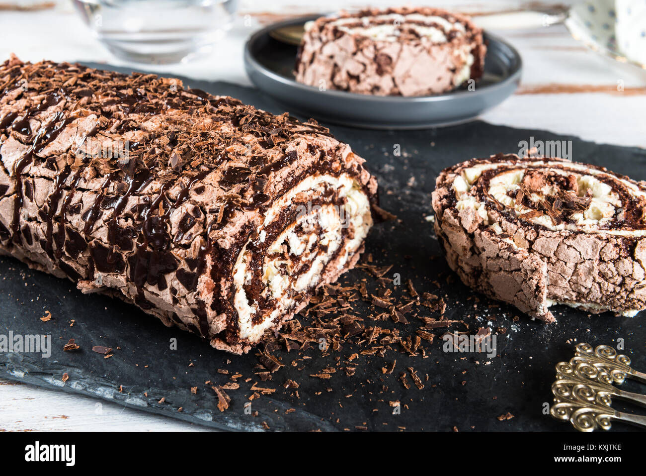 Belgian Chocolate Meringue Roulade filled with whipped cream and ...