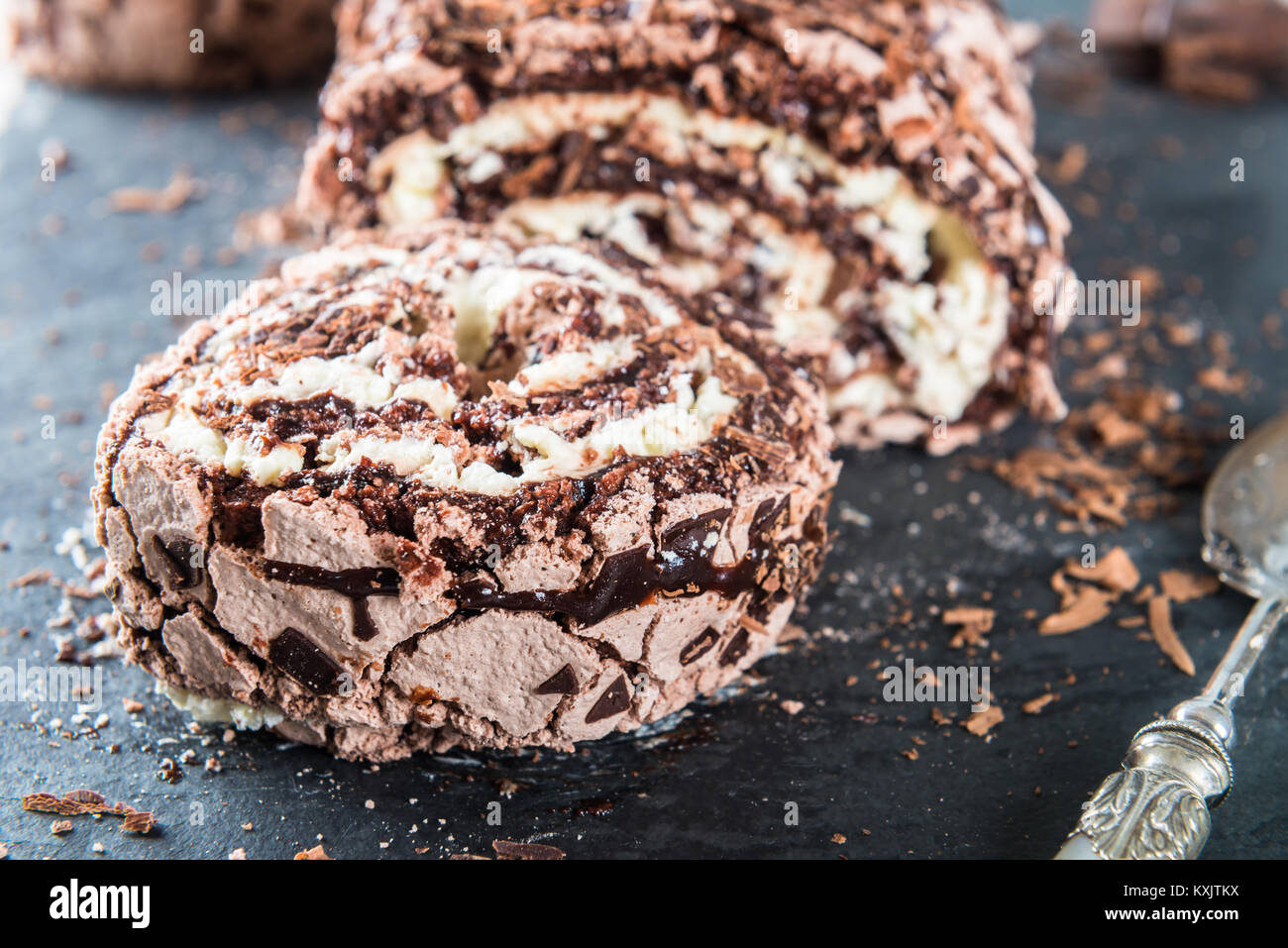 Belgian Chocolate Meringue Roulade filled with whipped cream and ...