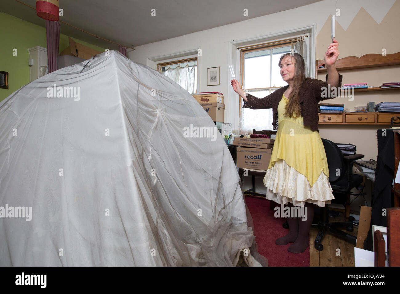 Woman who suffers from electromagnetic hypersensitivity intolerance ...