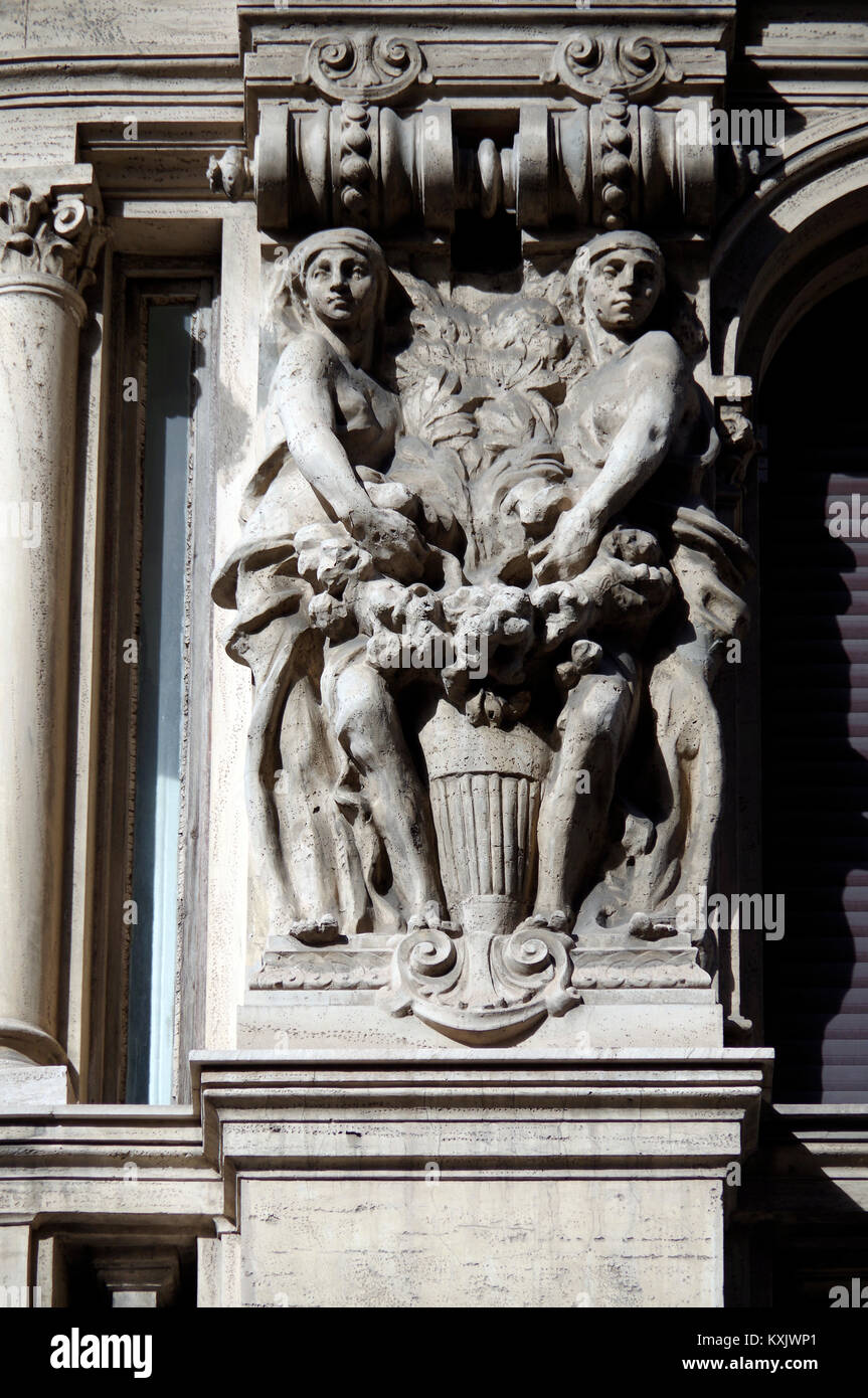 Sculptured figures as part of huge bracket at first floor level on a ...