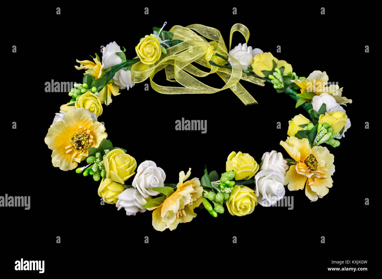 Yellow flower diadem isolated on black background Stock Photo - Alamy