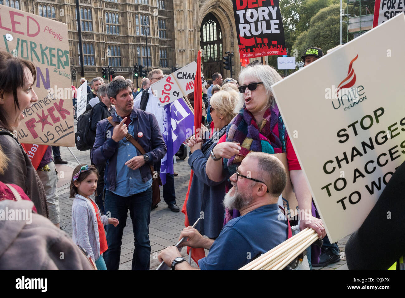 Protesters talk with voice and hands before the march by deaf and ...