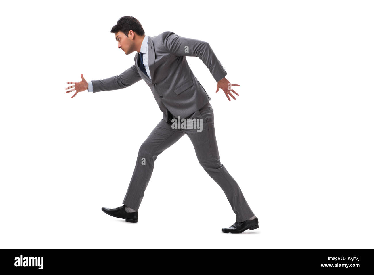 Young businessman running forward isolated on white Stock Photo - Alamy