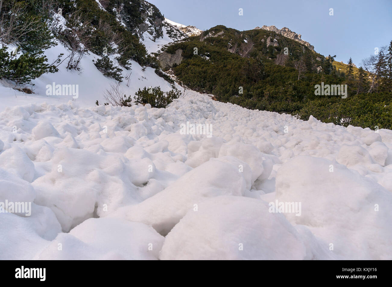 Snow lumps after descent of avalanche. High Tatras. Poland Stock Photo ...