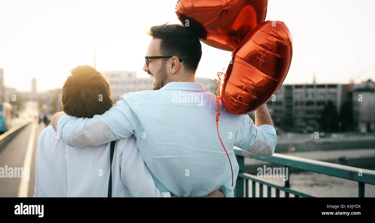 Romantic couple in love dating in sunset outdoor Stock Photo - Alamy