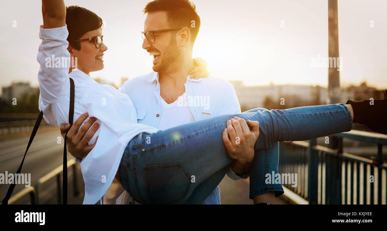 Romantic couple in love dating in sunset outdoor Stock Photo - Alamy