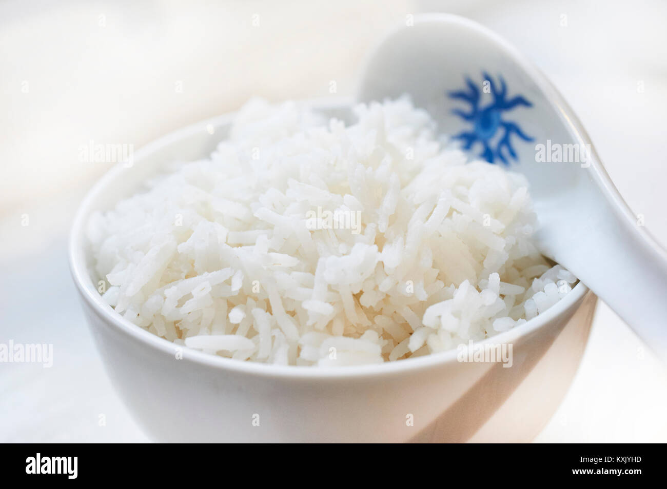 Jasmine Rice in a white bowl Stock Photo - Alamy