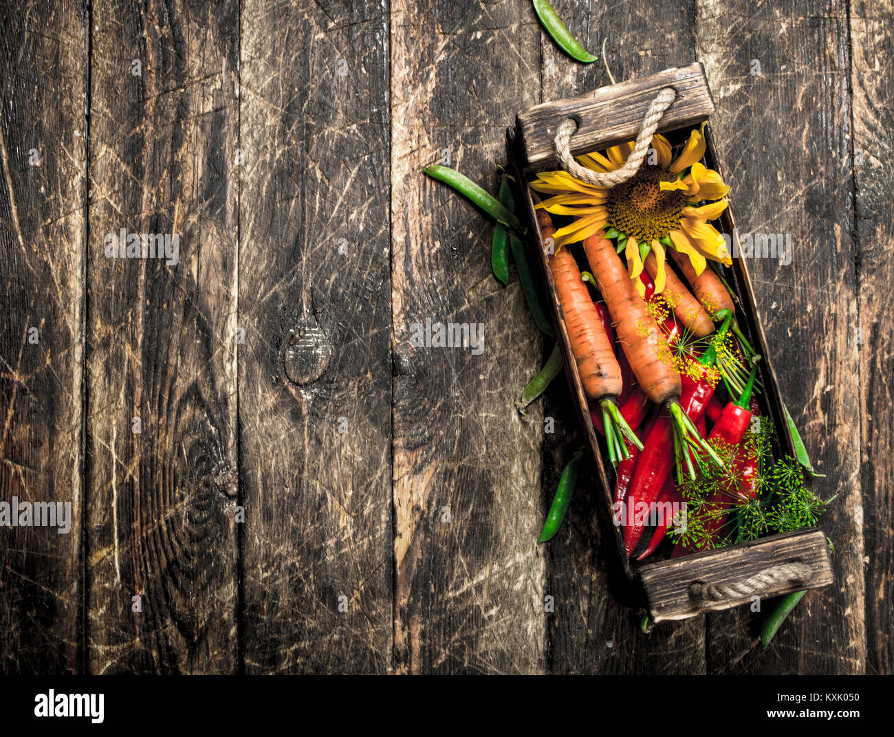 Organic food. Fresh harvest of vegetables. On a wooden background Stock ...