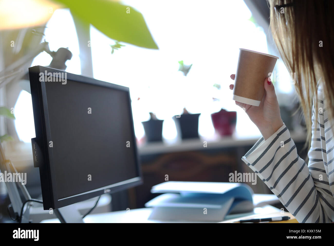 Daily routine. Woman in the office Stock Photo - Alamy