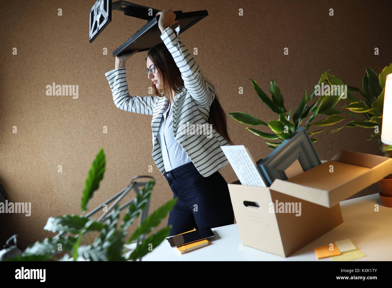 Woman being fired from work Stock Photo - Alamy
