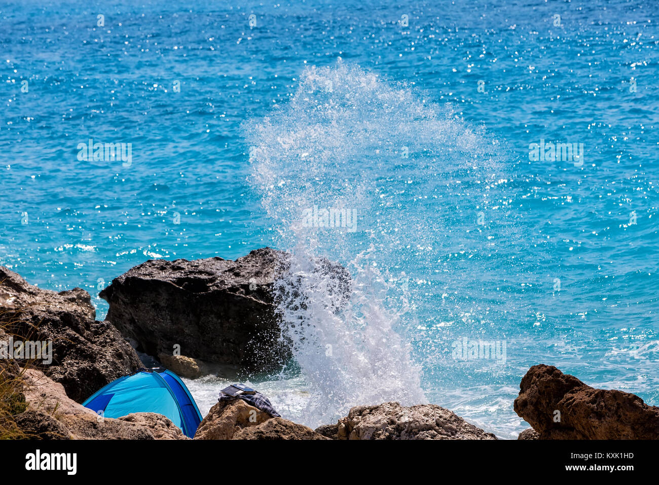 Sea waves crashing on rocks at the Kavalikefta Beach in Lefkada Island ...