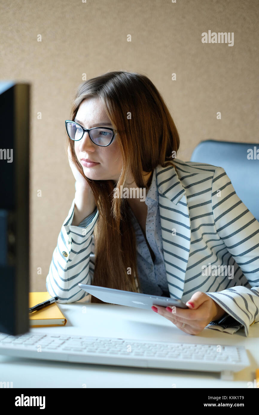Daily routine. Woman in the office Stock Photo - Alamy
