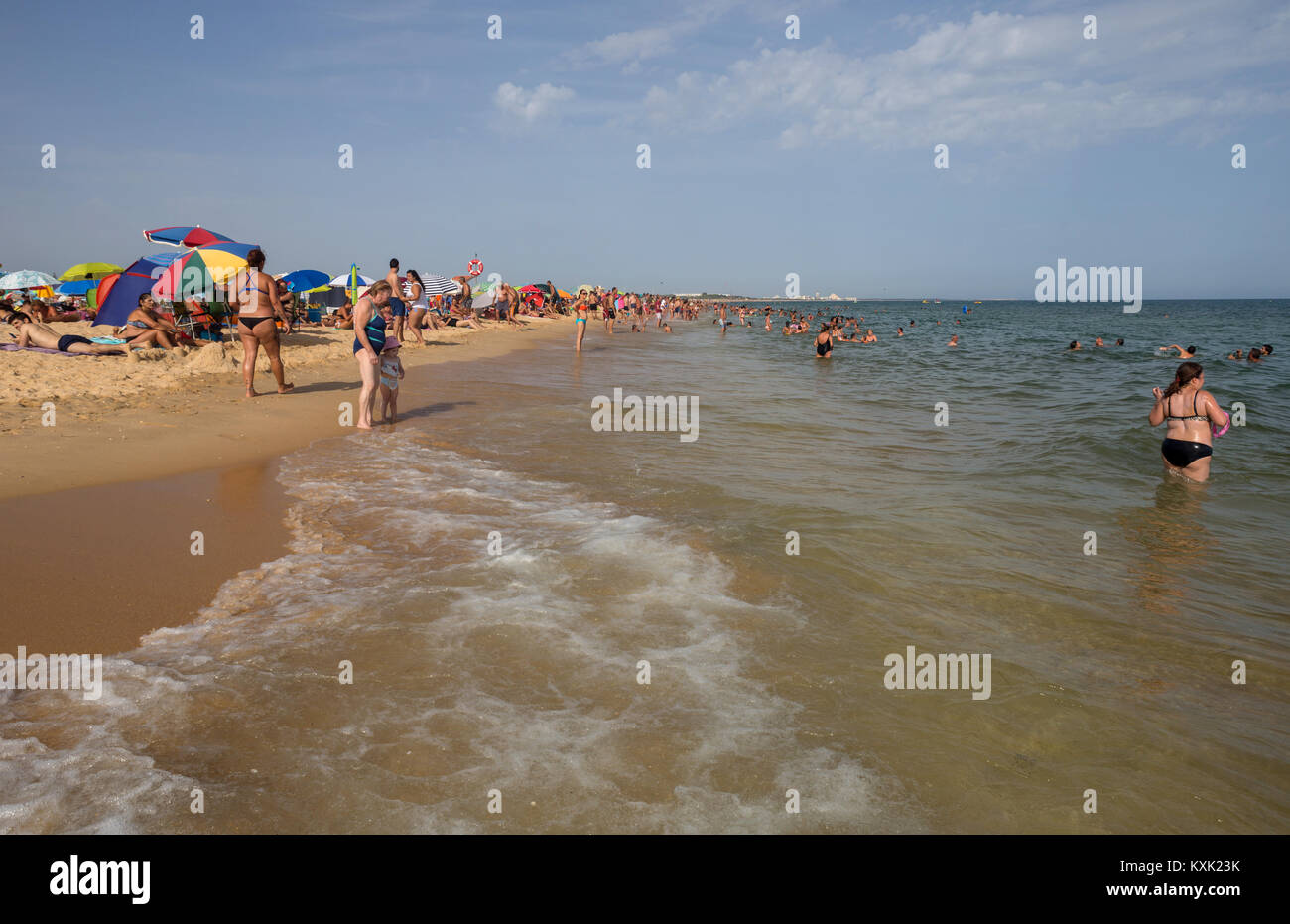 MANTA ROTA, PORTUGAL - AUGUST 25, 2017: People at the famous beach of ...
