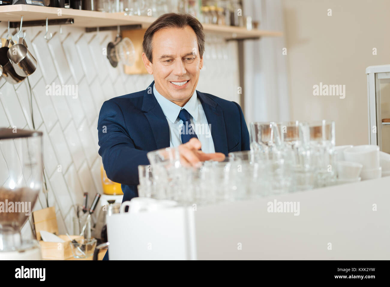 Pleasant responsible man standing hi-res stock photography and images ...