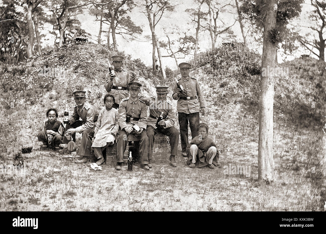 German Soldiers with Chinese Children during Occupation Stock Photo - Alamy