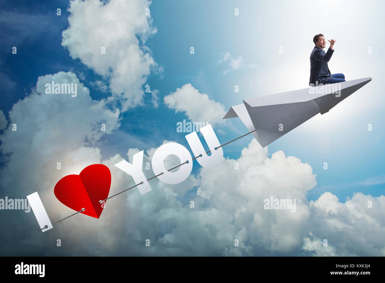 Romantic concept with man on paper plane I Love you Stock Photo - Alamy