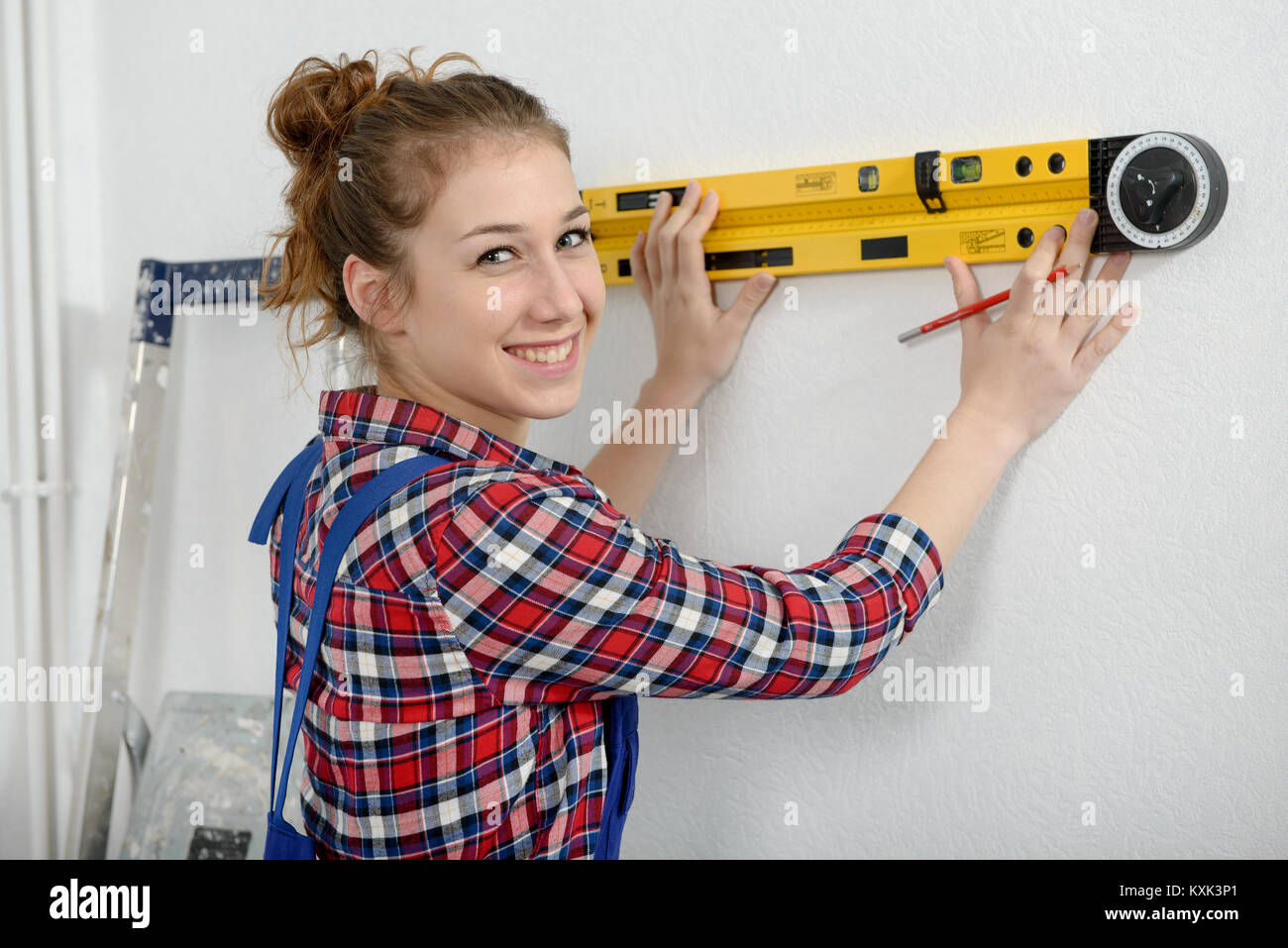 Using a spirit level hi-res stock photography and images - Alamy