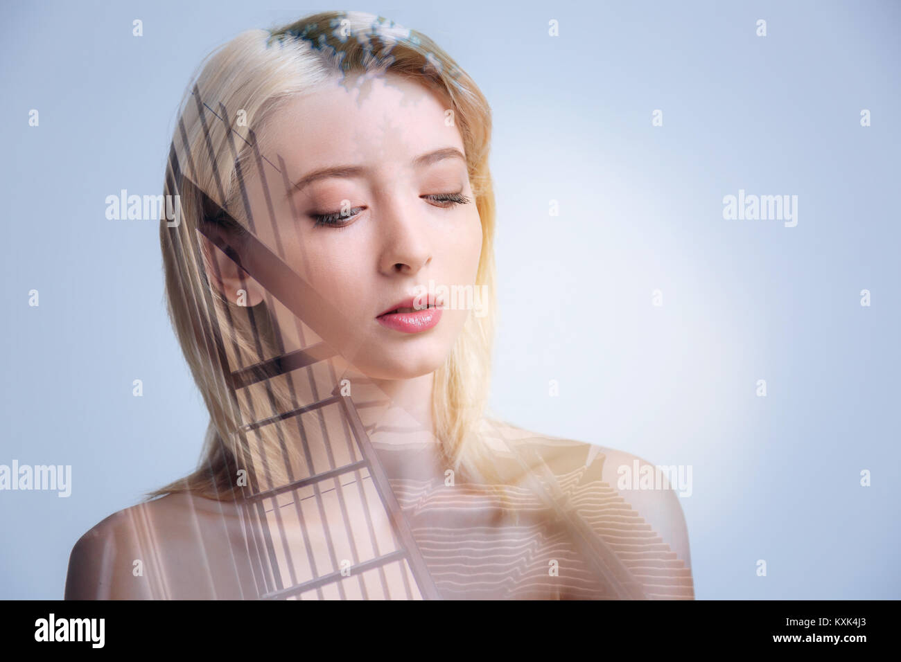 Beautiful young woman closing her eyes Stock Photo - Alamy
