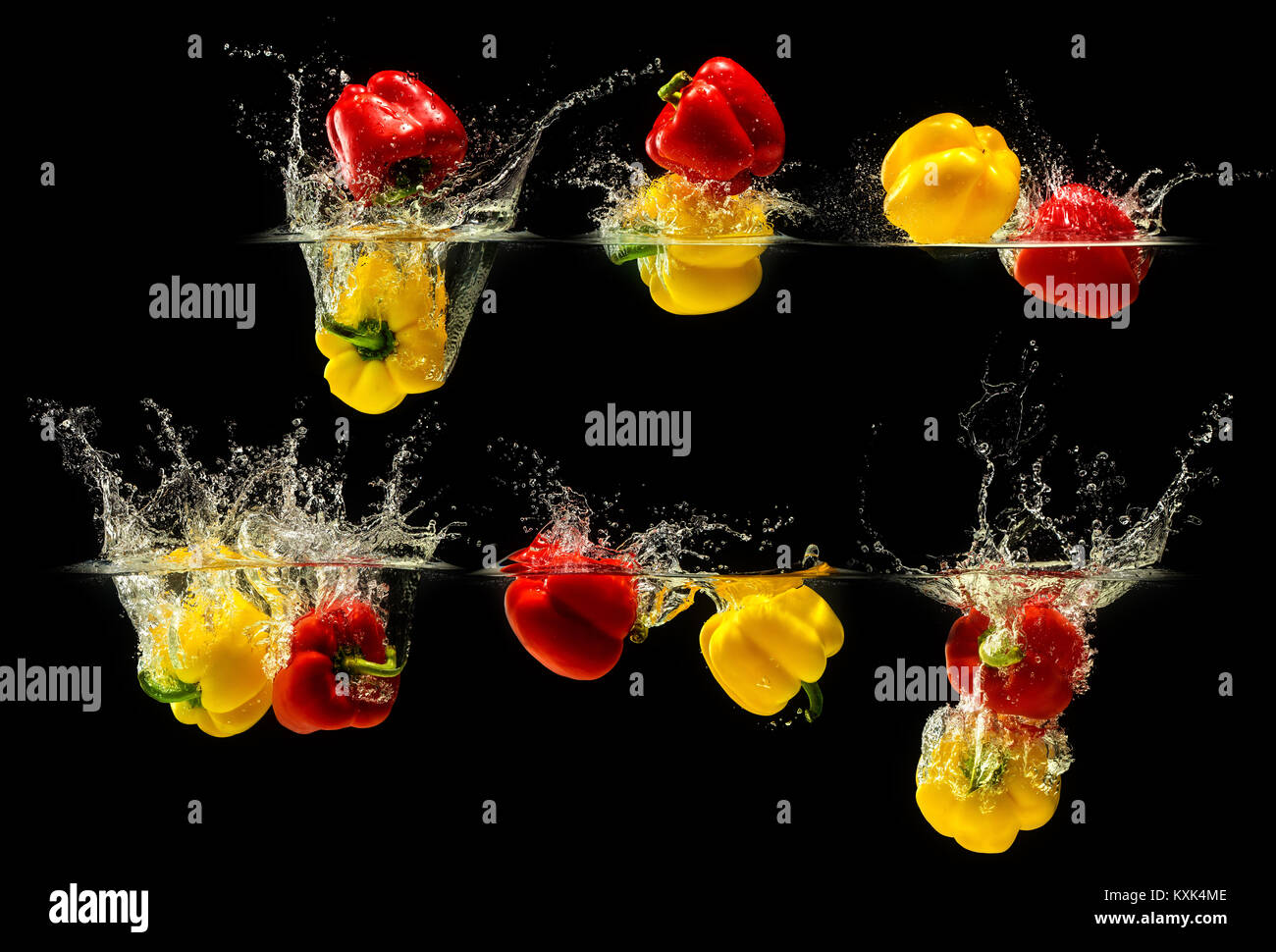 Group of bell pepper falling in water Stock Photo - Alamy