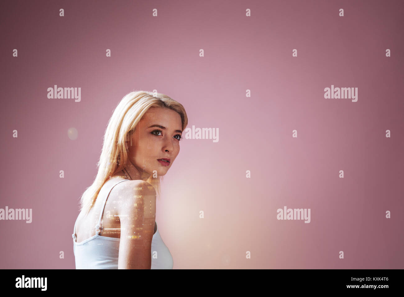Nice young woman looking in front of her Stock Photo - Alamy