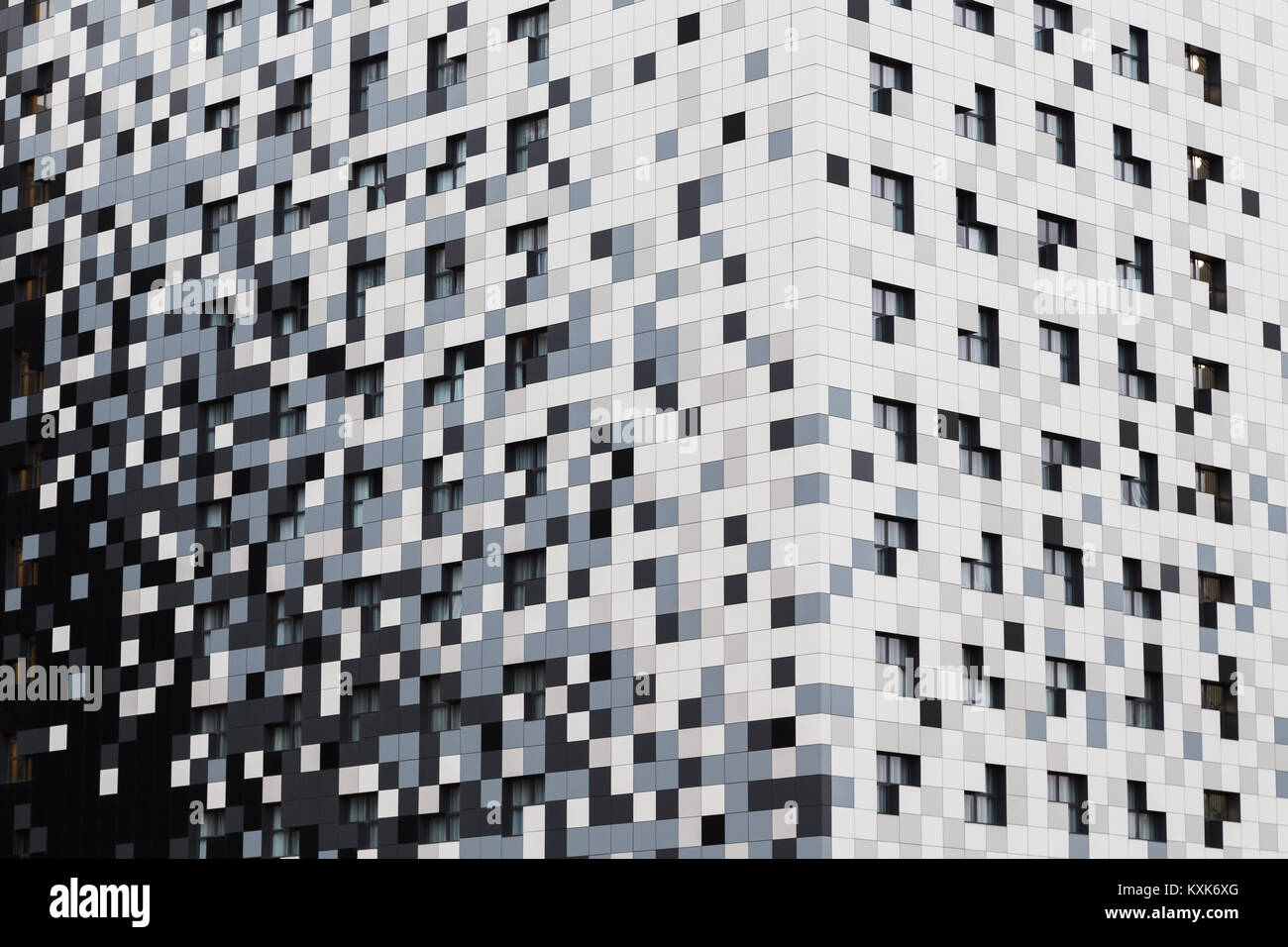 Fragmented pattern of black, white and grey blocks on a modern hotel ...